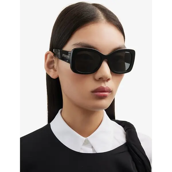 Prada Pr A08s Oval-Frame Sunglasses - Black | Editorialist