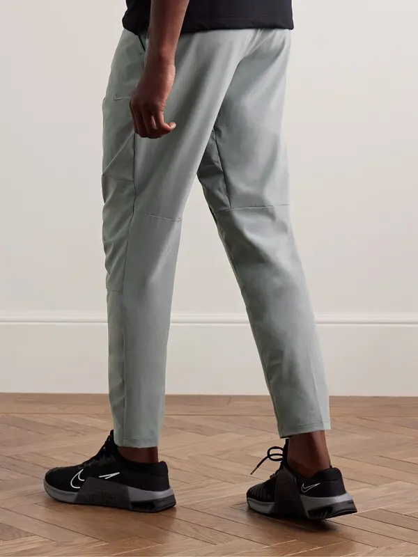 Nike Unlimited Tapered Dri-Fit Trousers In Gray - 50% Off | Editorialist