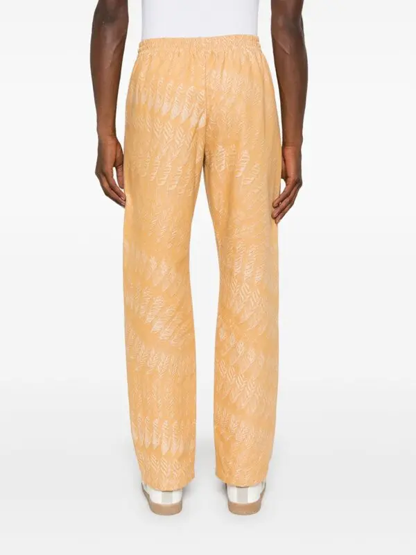 COUNTY OF MILAN Marcelo Burlon Aop Feather Trousers - Neutrals