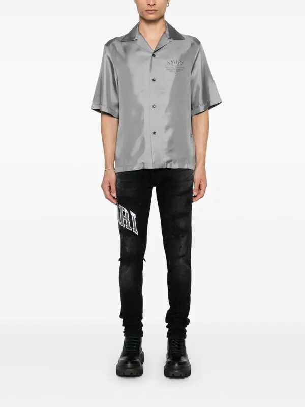 Amiri Varsity Logo Repair Jeans
