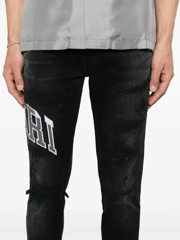 Amiri Varsity Logo Repair Jeans