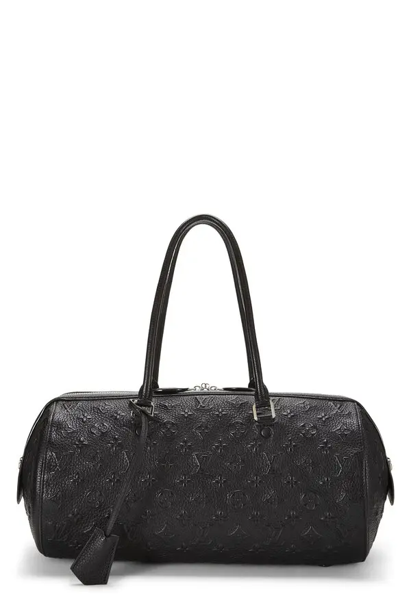 LOUIS VUITTON Monogram Revelation Neo Papillon