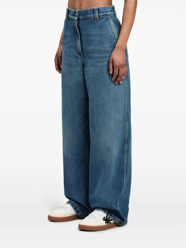 Palm Angels Bear Appliqué Wide Leg Jeans
