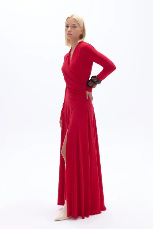 nocturne red dress Our client in the Crimson nocturne gown- serving exactly what a red gown  should. Cinched, sculpted and finished with a sweep that stays with you.  Shop The Look: * Online at AdaaraCouture.in *
