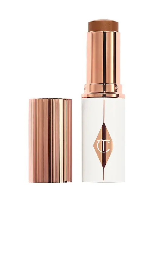 Charlotte Tilbury Unreal Skin Sheer Glow Tint Hydrating Foundation Stick - 14 Deep