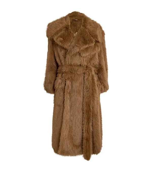 The Chicest Fall Coat Trends of 2024: Plaid, Leather, & Faux Fur