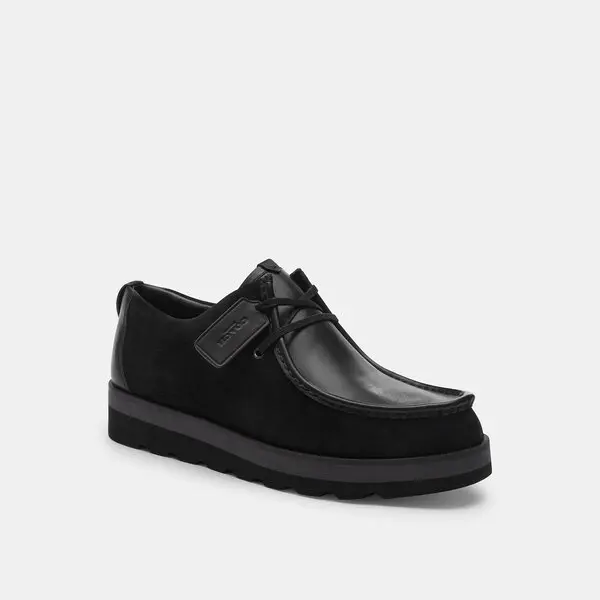 Coach Apron Toe Lace-Up Boots In Black - 50% Off | Editorialist display picture 1