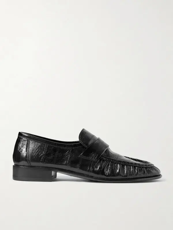 THE ROW Soft Paneled Glossed-eel Loafers - Black