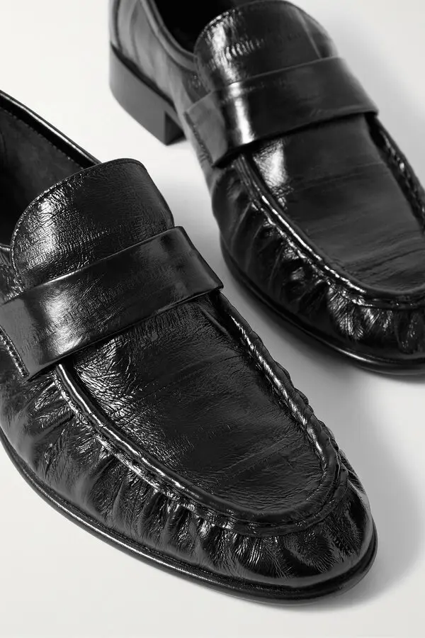 THE ROW Soft Paneled Glossed-eel Loafers - Black