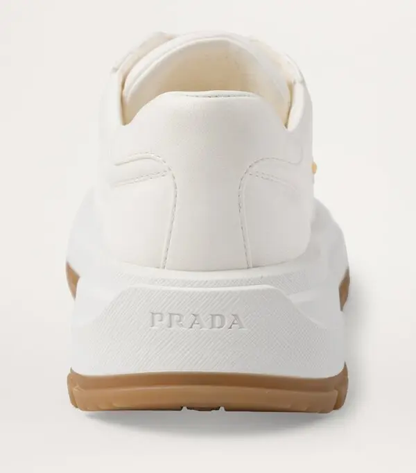 Prada Leather Triangle Sneakers - Neutral