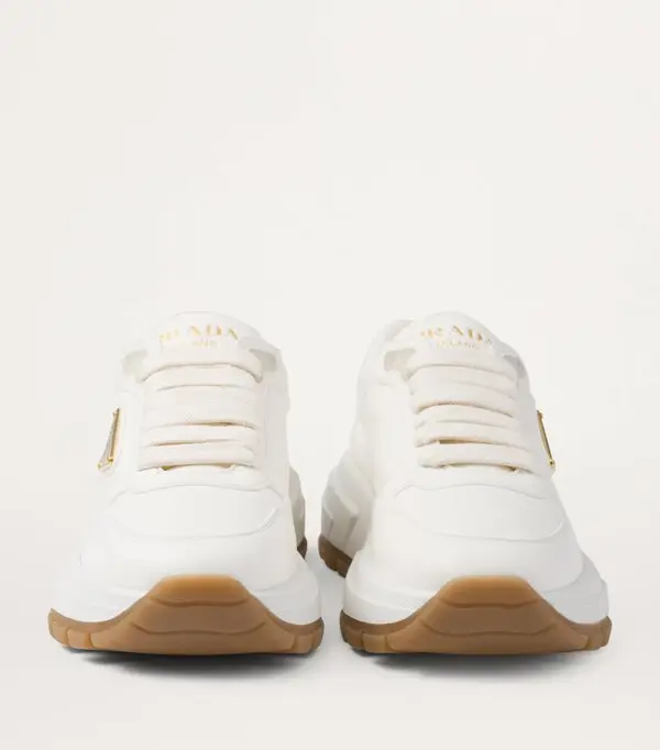 Prada Leather Triangle Sneakers - Neutral