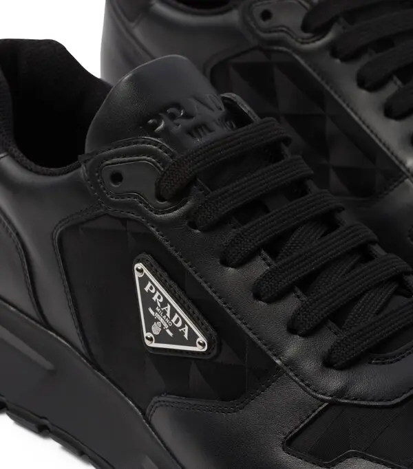 Prada Leather And Re-nylon Sneakers - Black