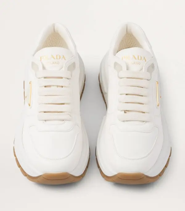 Prada Leather Triangle Sneakers - Neutral
