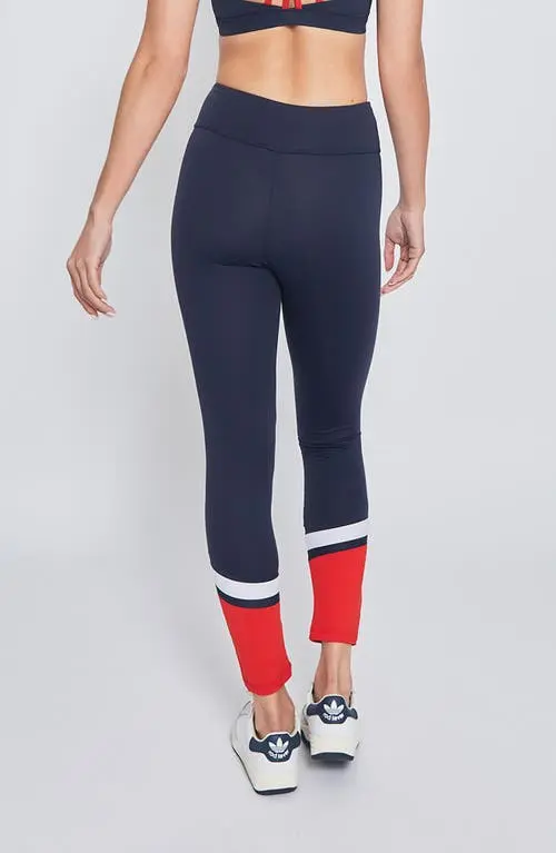 L'ETOILE SPORT Performance Legging - Navy W/ Red And White Trim