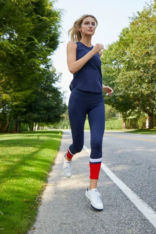 L'ETOILE SPORT Performance Legging - Navy W/ Red And White Trim