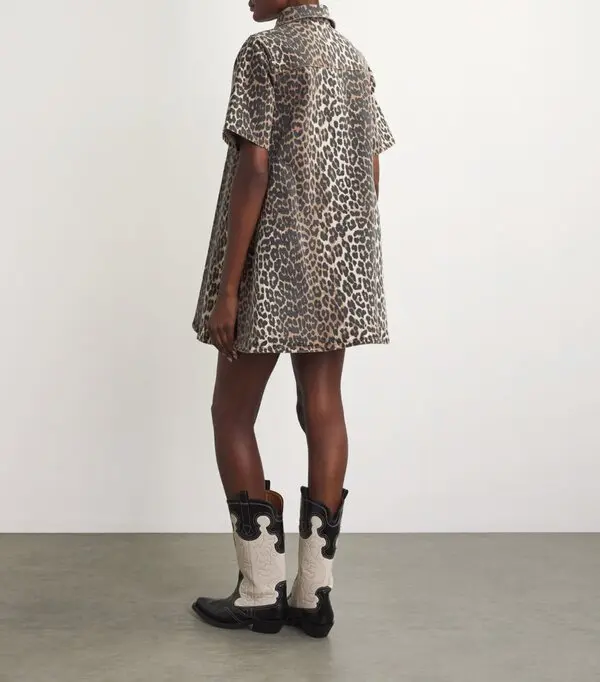 white christmas dresses Ganni LEOPARD OPEN-BACK MINI DENIM DRESS