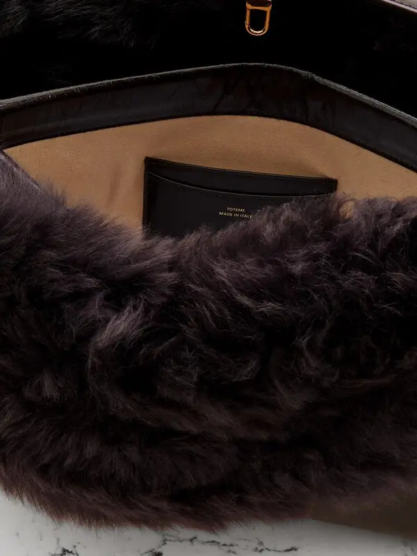 TOTEME T-lock Shearling Shoulder Bag