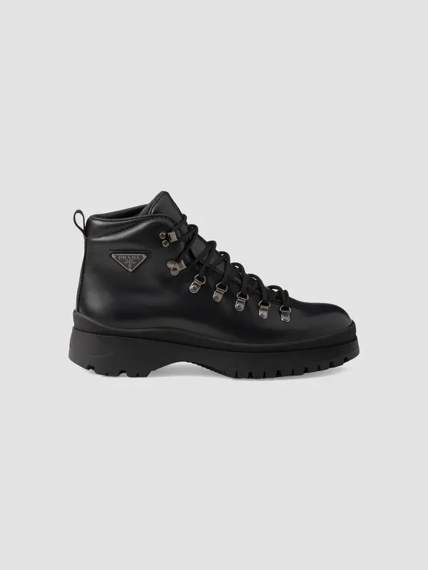 Prada Brixxen Leather Booties - Black