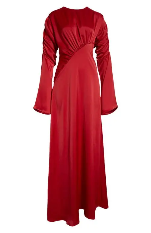 orire red dress Meghan Markle wears a strappy red midi dress by Nigerian designer, ORIRE  for the Women in Leadership Summit, in conversation with DG of the  @worldtradeorganization Dr Ngozi Okonjo Iweala; moderated by media
