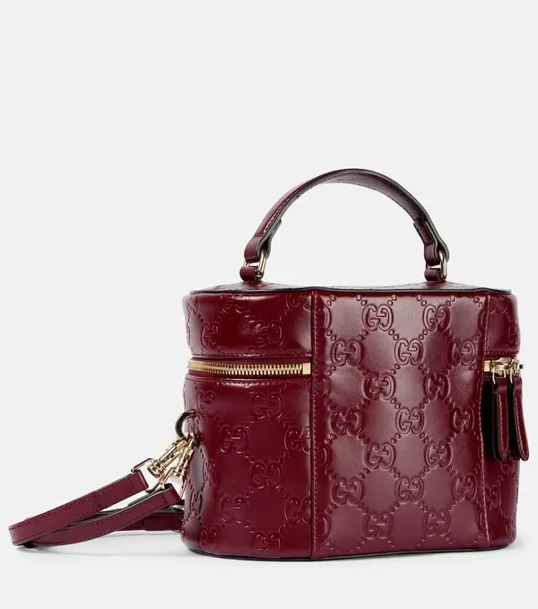 GUCCI GGパターン レッドバニティーケース Gucci Gg Embossed Leather Vanity Bag - Burgundy | Editorialist