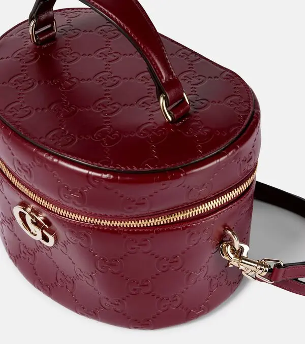 GUCCI GGパターン レッドバニティーケース Gucci Gg Embossed Leather Vanity Bag - Burgundy | Editorialist
