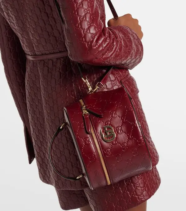 Gucci Gg Embossed Leather Vanity Bag