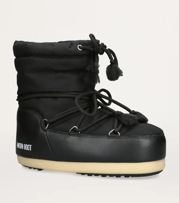 YVES SALOMON X Moon Boots Ankle Boots