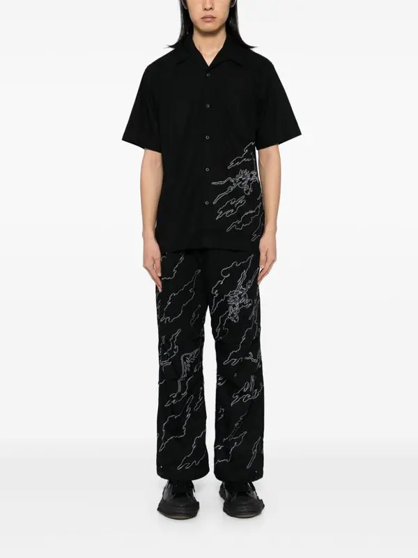 MAHARISHI Maha Basquiat Trousers