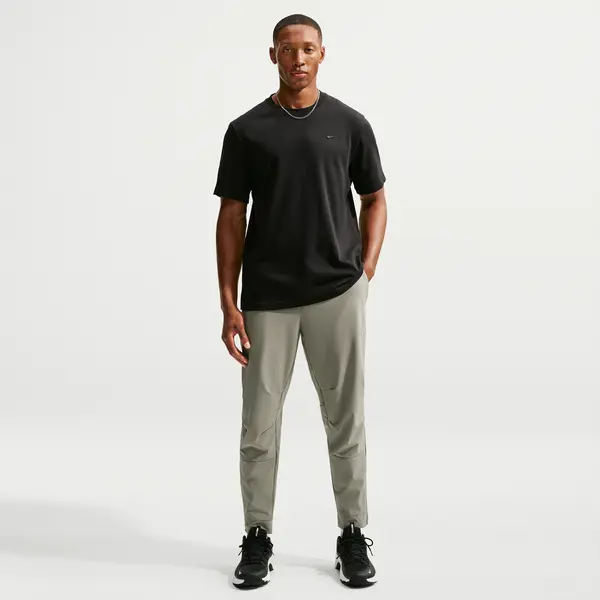 Nike Unlimited Dri-fit Zippered Cuff Versatile Pants - Green