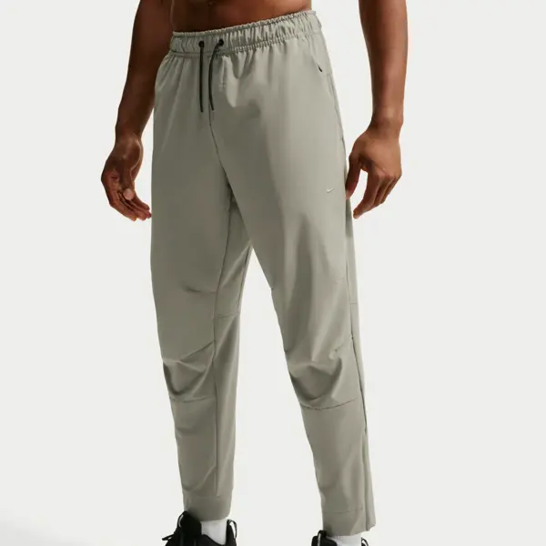 Nike Unlimited Dri-fit Zippered Cuff Versatile Pants - Green