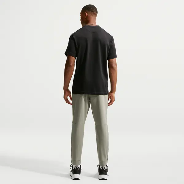 Nike Unlimited Dri-fit Zippered Cuff Versatile Pants - Green