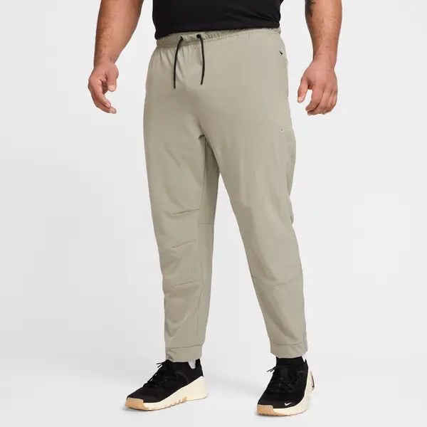 Nike Unlimited Dri-fit Zippered Cuff Versatile Pants - Green
