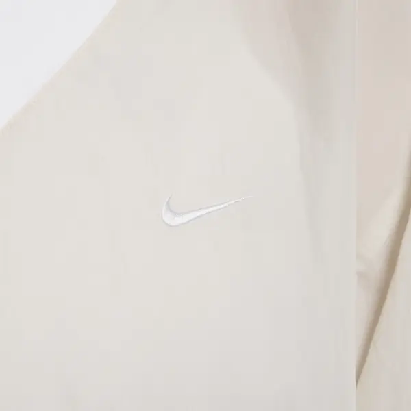 Buy Nike Loose Uv Woven Long-sleeve V-neck Top Brown At 38% Off