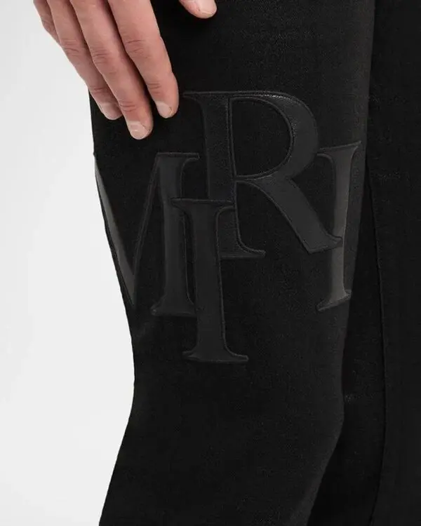Amiri Staggered Logo Waxed Skinny Jeans - Black