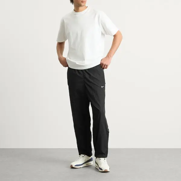 Nike Solo Swoosh Woven Track Pant - Black/White | Editorialist