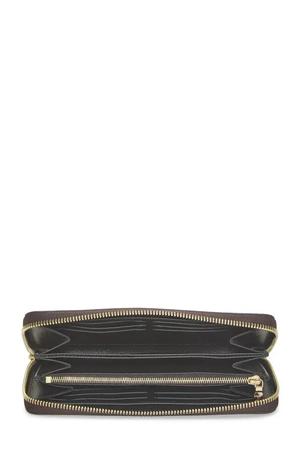 LOUIS VUITTON Monogram Reversed Zippy Continental Wallet - Brown