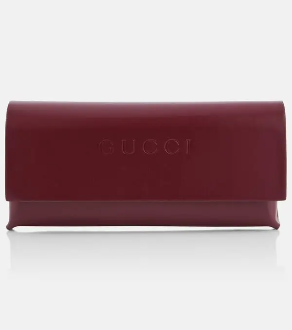Gucci Logo Embellished Oval Sunglasses