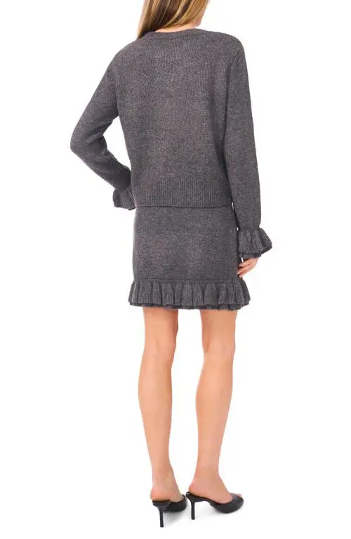 CECE DUPRAZ Fitted Sweater Skirt With Ruffle Hem