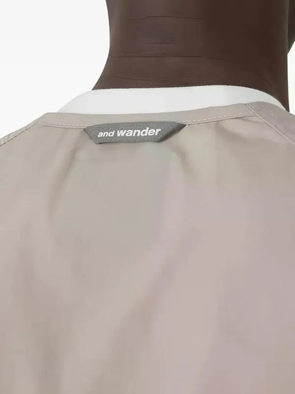 AND WANDER Zip-front Pocketed Vest