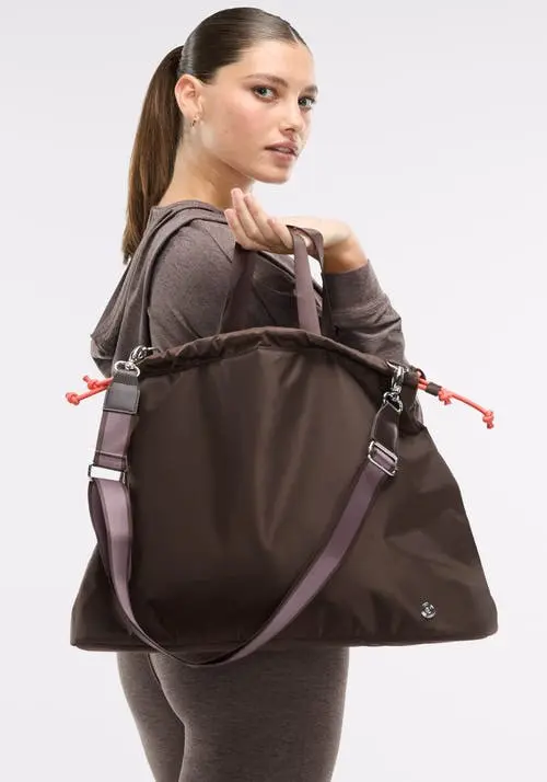 PELOTON Cinch Sack Crossbody Bag - Cocoa