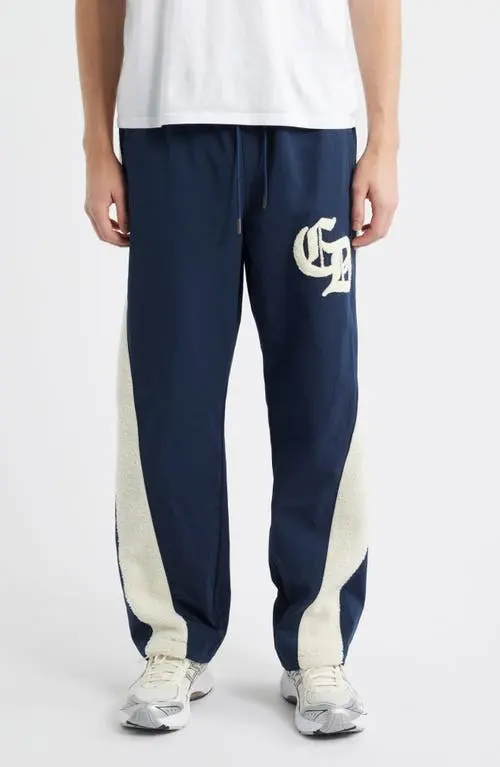 CRIMINAL DAMAGE Logo Appliqué Track Pants - Navy/ecru