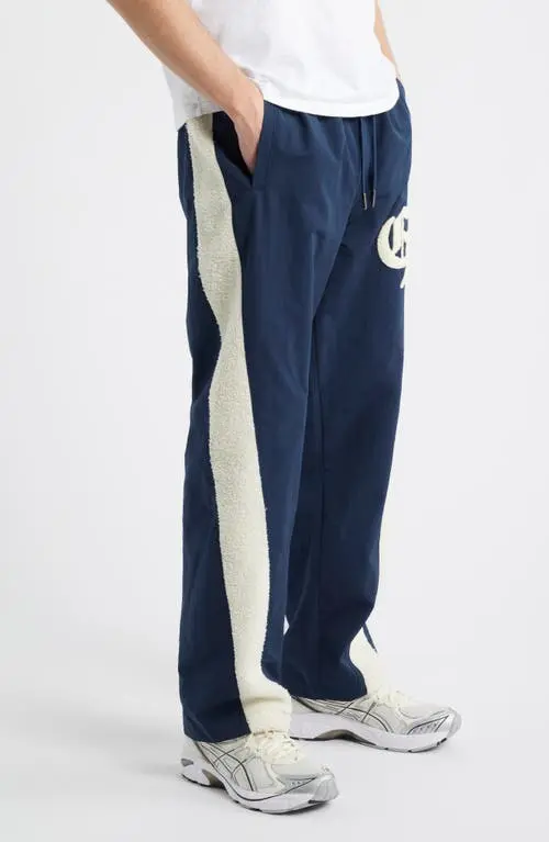 CRIMINAL DAMAGE Logo Appliqué Track Pants - Navy/ecru