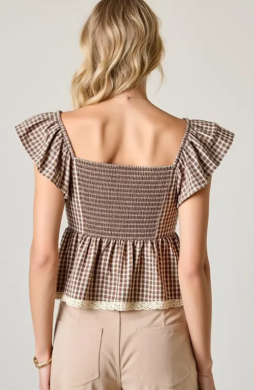 MODENAIRE Peplum Top With Flutter Sleeves And Front Tie