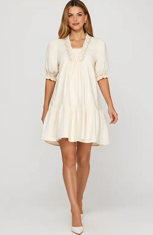 Modenaire Smocked Sleeve Mini Dress With Embroidered Neckline And Tiered  Hem - Ivory | Editorialist