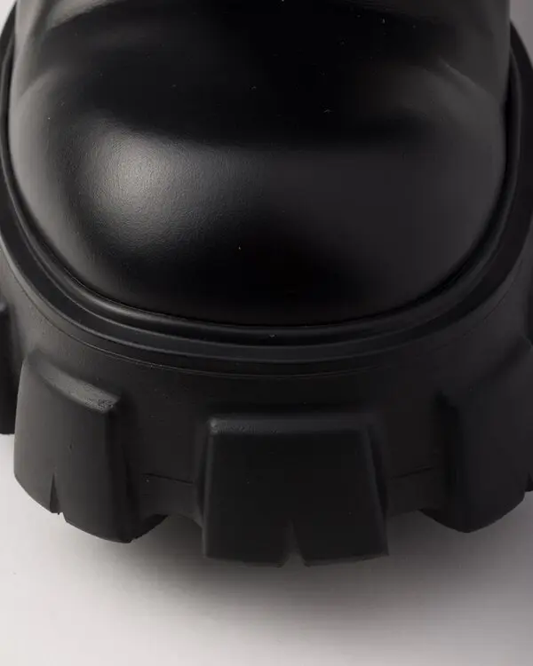 Prada Monolith Brushed Leather And Re-nylon Boots With Pouch