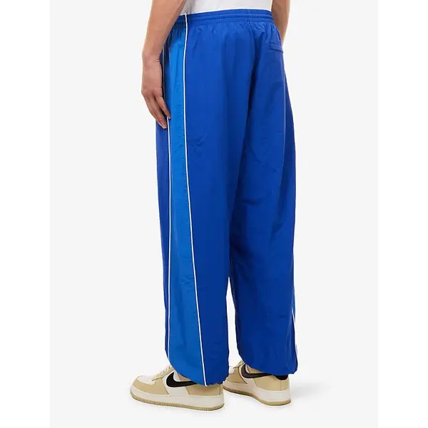 AWAKE NY Logo-embroidered Relaxed-fit Shell Track Bottoms