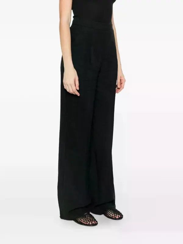 OCCLEUS Kelsey Flared Trousers