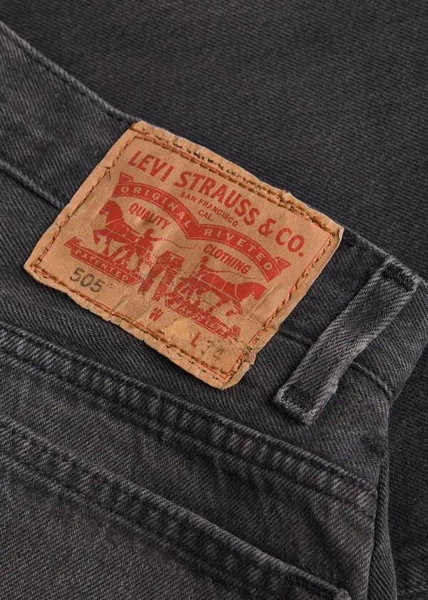 B Sides Lasso Relaxed Barrel-leg Jeans