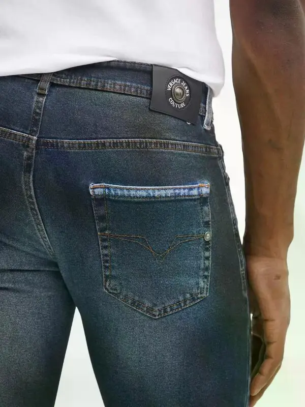 Versace Faded-pocket Jeans