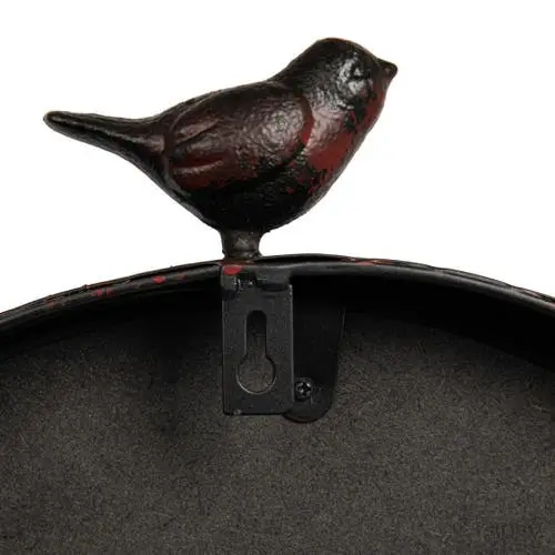 STORIED HOME Oval Metal Wall Clock With Bird